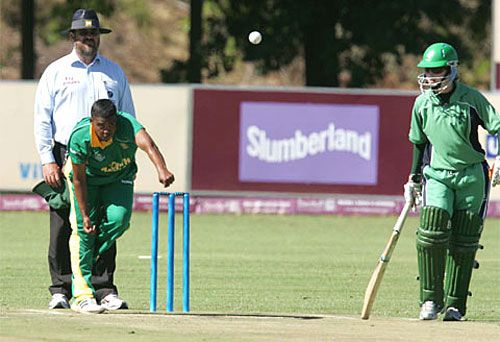 Ashlyn Kilowan bowls as Caitriona Beggs looks on | ESPNcricinfo.com