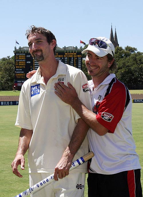 Mark Cleary congratulates Jason Gillespie after his final Pura Cup ...