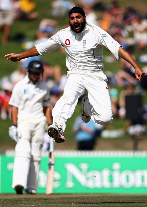 Flying high: Monty Panesar celebrates Jamie How's dismissal ...