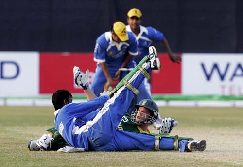 Albie Morkel is run out after colliding with Dhiman Ghosh ...