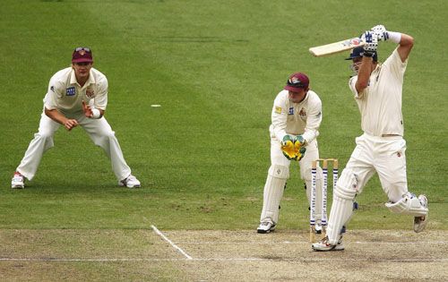 Cameron White forces the ball off his back foot on his way to 73 ...