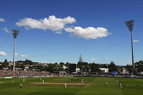 A wide-angle view of the picturesque Seddon Park in Hamilton ...