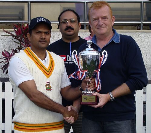 LSW Warrior's Munir Dar accepts the Saturday League Trophy from HKCA ...