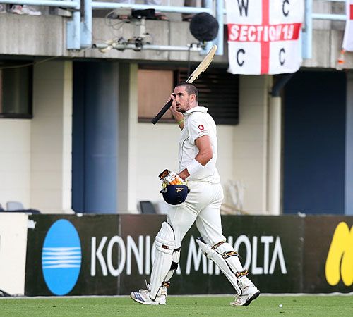 Kevin Pietersen takes the applause as he heads back to the pavilion ...