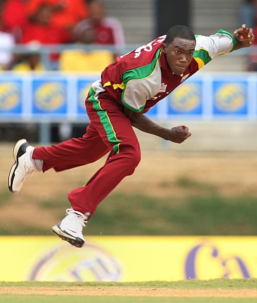 An airborne Jerome Taylor in his follow-through | ESPNcricinfo.com
