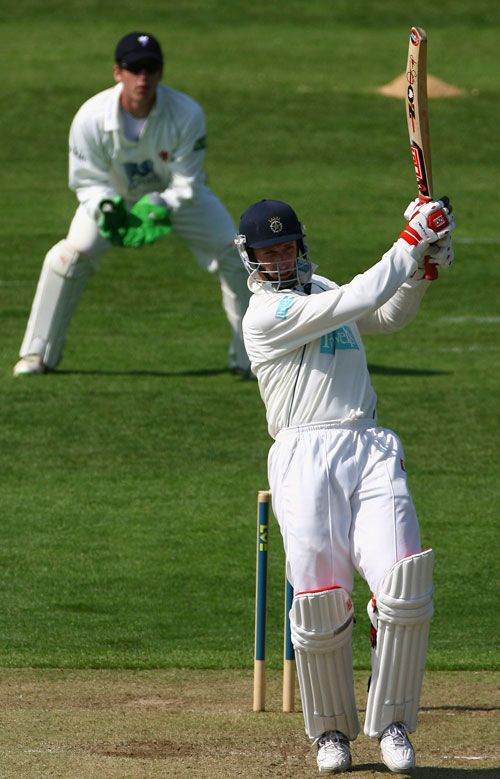 John Crawley rocks back to pull on his way to a half-century ...