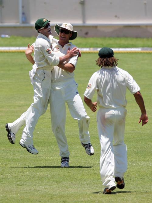 Stuart Clark is congratulated on his catch to remove Runako Morton ...