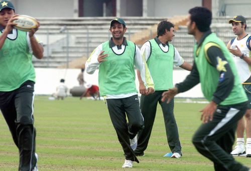 Members of the Pakistan side enjoy a game of rugby during training ...