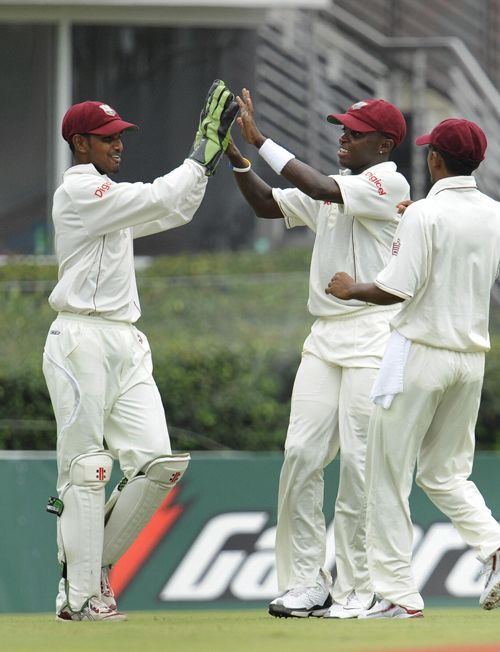 Denesh Ramdin is congratulated on catching Phil Jaques | ESPNcricinfo.com