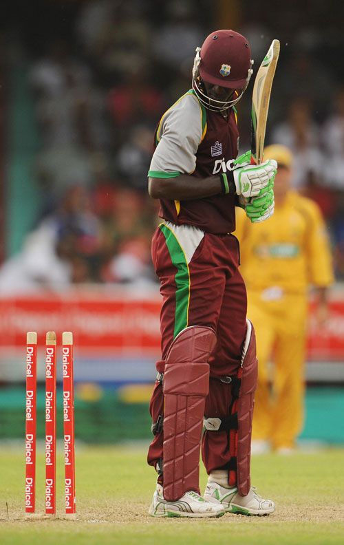 Darren Sammy looks down to find that he has been bowled | ESPNcricinfo.com
