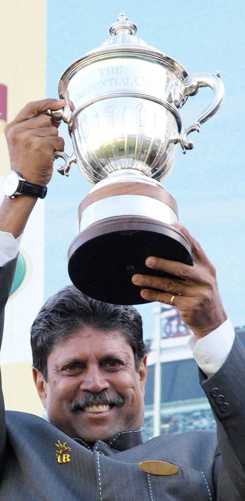25 years on ... Kapil Dev lifts the Prudential World Cup at Lord's ...
