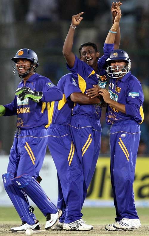 Ajantha Mendis is congratulated by his team-mates | ESPNcricinfo.com