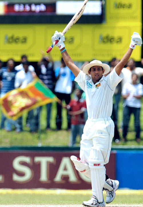 Tillakaratne Dilshan lifts his arms in celebration | ESPNcricinfo.com