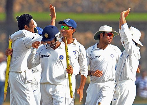 The Indian players celebrate their win | ESPNcricinfo.com