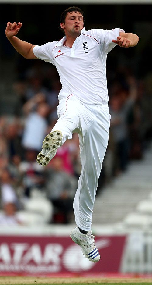 Steve Harmison leaps high to celebrate his two-wicket burst ...