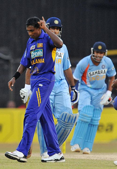 Thilan Thushara celebrates the dismissal of Rohit Sharma | ESPNcricinfo.com