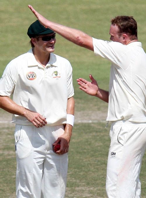 Doug Bollinger has something interesting to tell Shane Watson ...