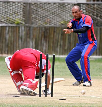 Roy Lamsam is bowled by Hamid Hassan. Hong Kong v. Afghanistan, ICC WCL ...