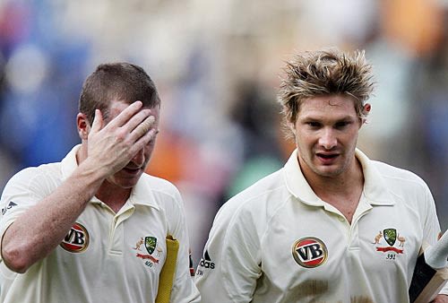 Brad Haddin and Shane Watson make their way back to the pavilion at the ... Brad Haddin and Shane Watson make their way back to the pavilion at the ...