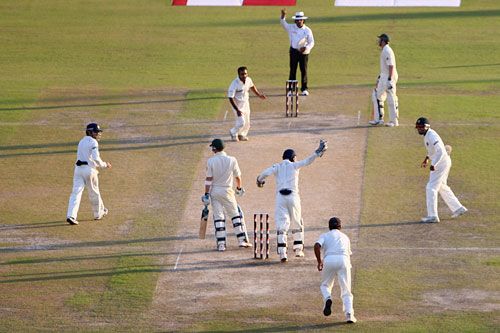 Amit Mishra traps Michael Clarke lbw for 23 on the last ball of the day ...