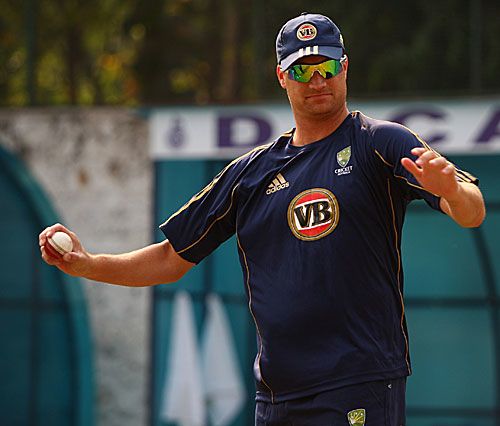 Stuart Clark warms up before a nets session | ESPNcricinfo.com