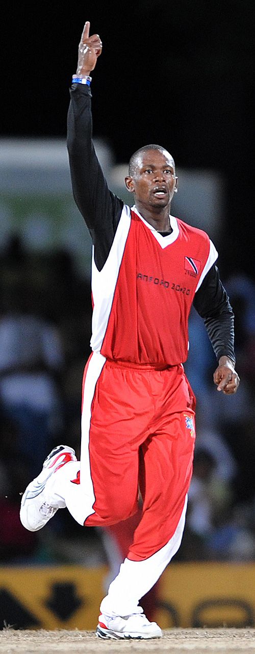 Navin Stewart celebrates one of his two late wickets | ESPNcricinfo.com