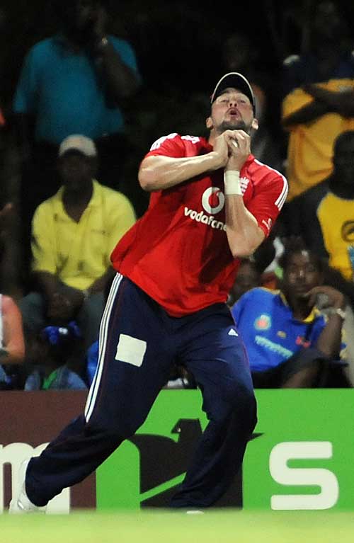 Steve Harmison has no problems with the lights to hold a catch at third ...