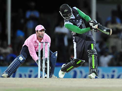 Andre Fletcher swings hard over the leg side | ESPNcricinfo.com