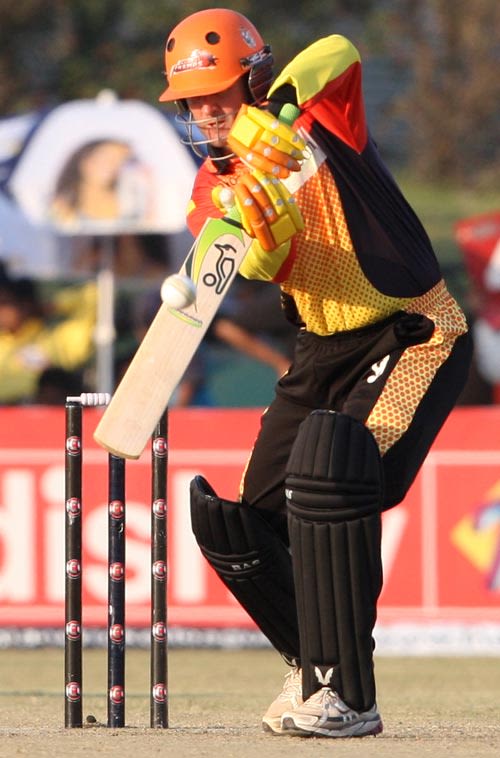 Nathan Astle prepares to play a shot during his unbeaten 68 ...