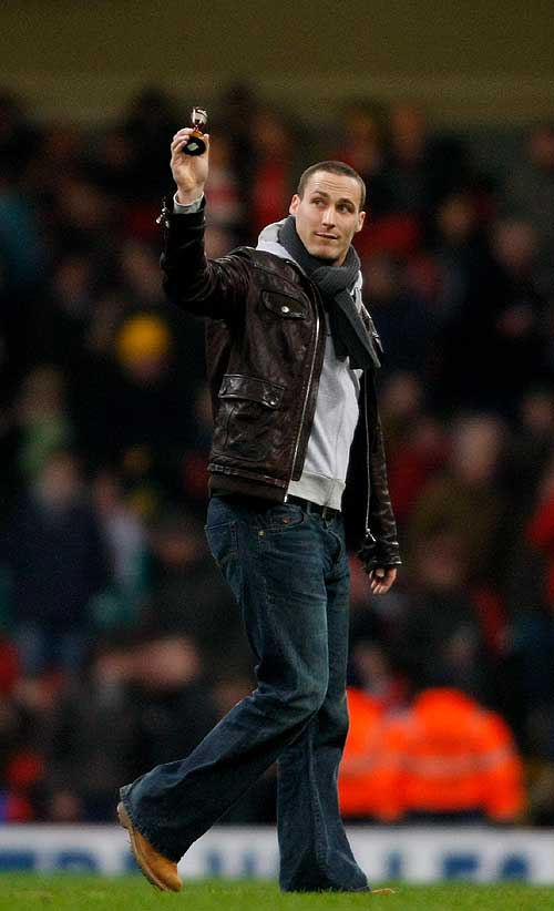 Simon Jones displays the Ashes at half time at the Millennium Stadium ...
