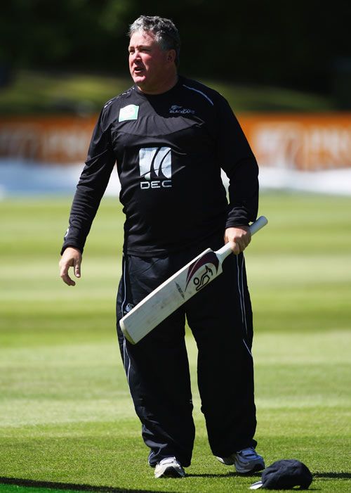 Andy Moles watches his players during a warm-up session | ESPNcricinfo.com