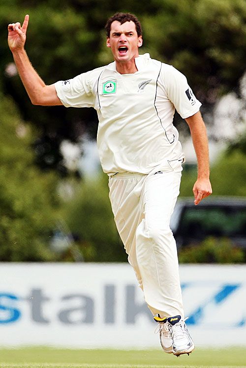 Kyle Mills celebrates one of his two wickets in the opening session ...