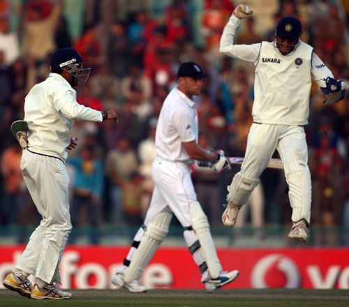 Indian players celebrate after Andrew Flintoff is caught at forward ...