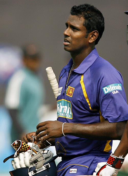 Angelo Mathews walks back after scoring an unbeaten 52 | ESPNcricinfo.com