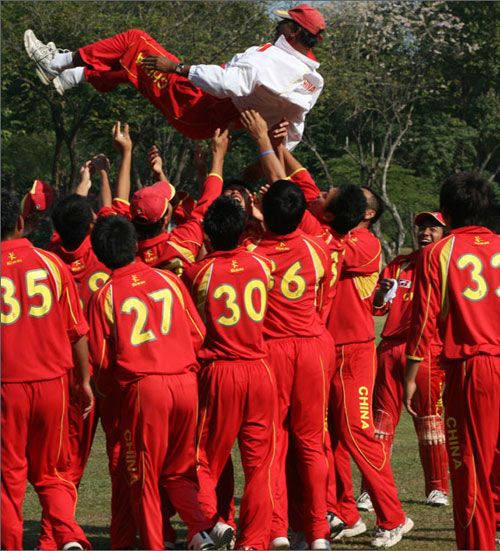 China celebrate their first major win | ESPNcricinfo.com
