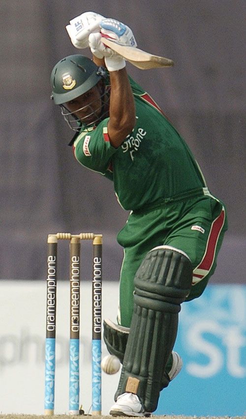 Raqibul Hasan drives during his half-century | ESPNcricinfo.com