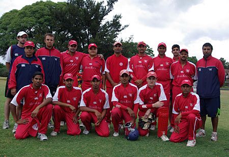 The Hong Kong team poses for the camera before taking to the field ...