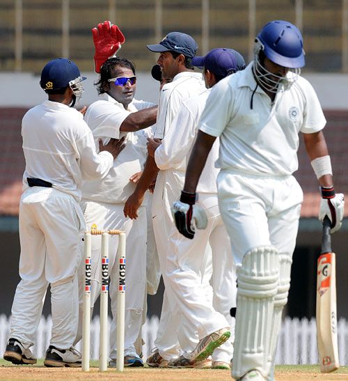 Ramesh Powar celebrates one of his three wickets | ESPNcricinfo.com