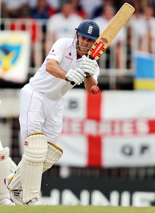 Andrew Strauss clips a four through midwicket during his first-day half ...