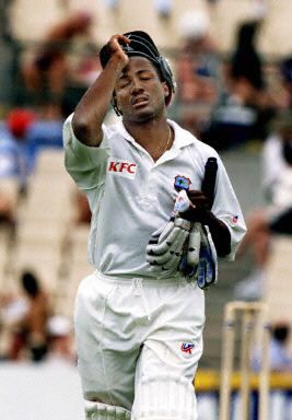 Brian Lara on his way to the pavilion | ESPNcricinfo.com