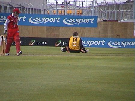 Walker stretches in between overs | ESPNcricinfo.com