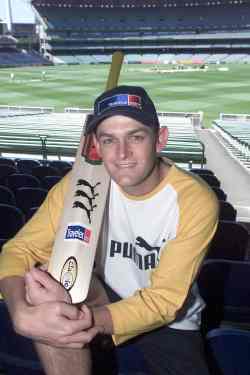 Adam Gilchrist with his new sponsored bat | ESPNcricinfo.com