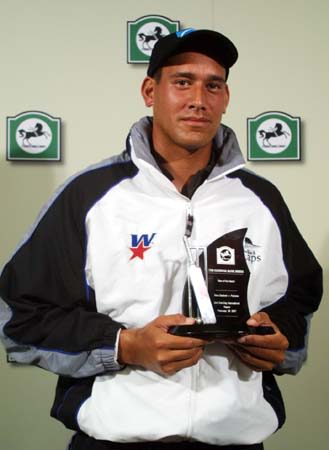 Tuffey holds his Player of the Match trophy | ESPNcricinfo.com