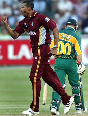 Mervyn Dillon celebrates after dismissing Herschelle Gibbs ...