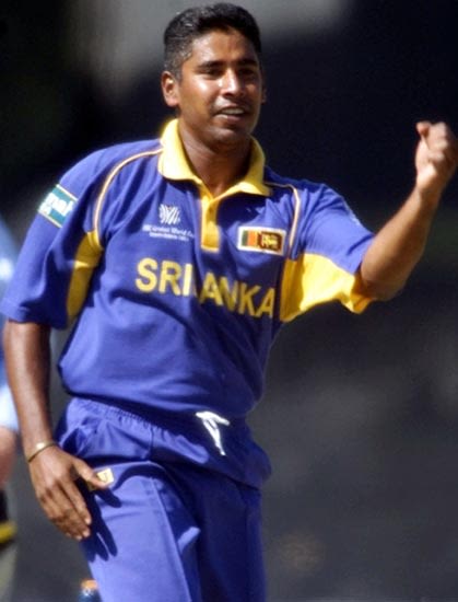 Chaminda Vaas celebrates after taking the wicket of Desmond Chumney ...