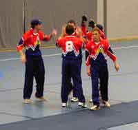The Spanish squad celebrate victory in the plate competition ...