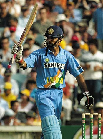 Hemang Badani acknowledges the cheers after reaching his half-century ...