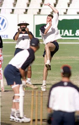 Bobby Simpson gets in close to film the players net practise ...