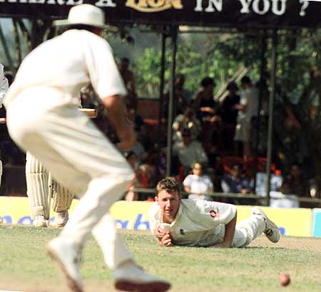 Robert Croft attempting to field off his own bowling | ESPNcricinfo.com