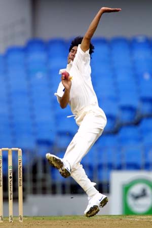 Sami delivers a ball on his Test debut | ESPNcricinfo.com
